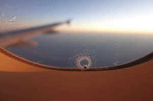 The Airplane Windows: Why Are They Round and Have Tiny Holes ...